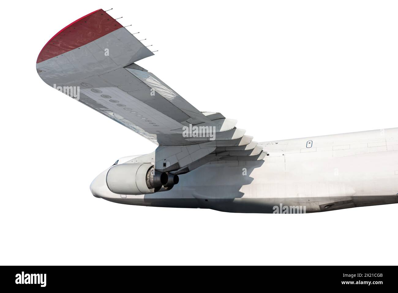 Wide body transport cargo aircraft flying isolated on white background ...