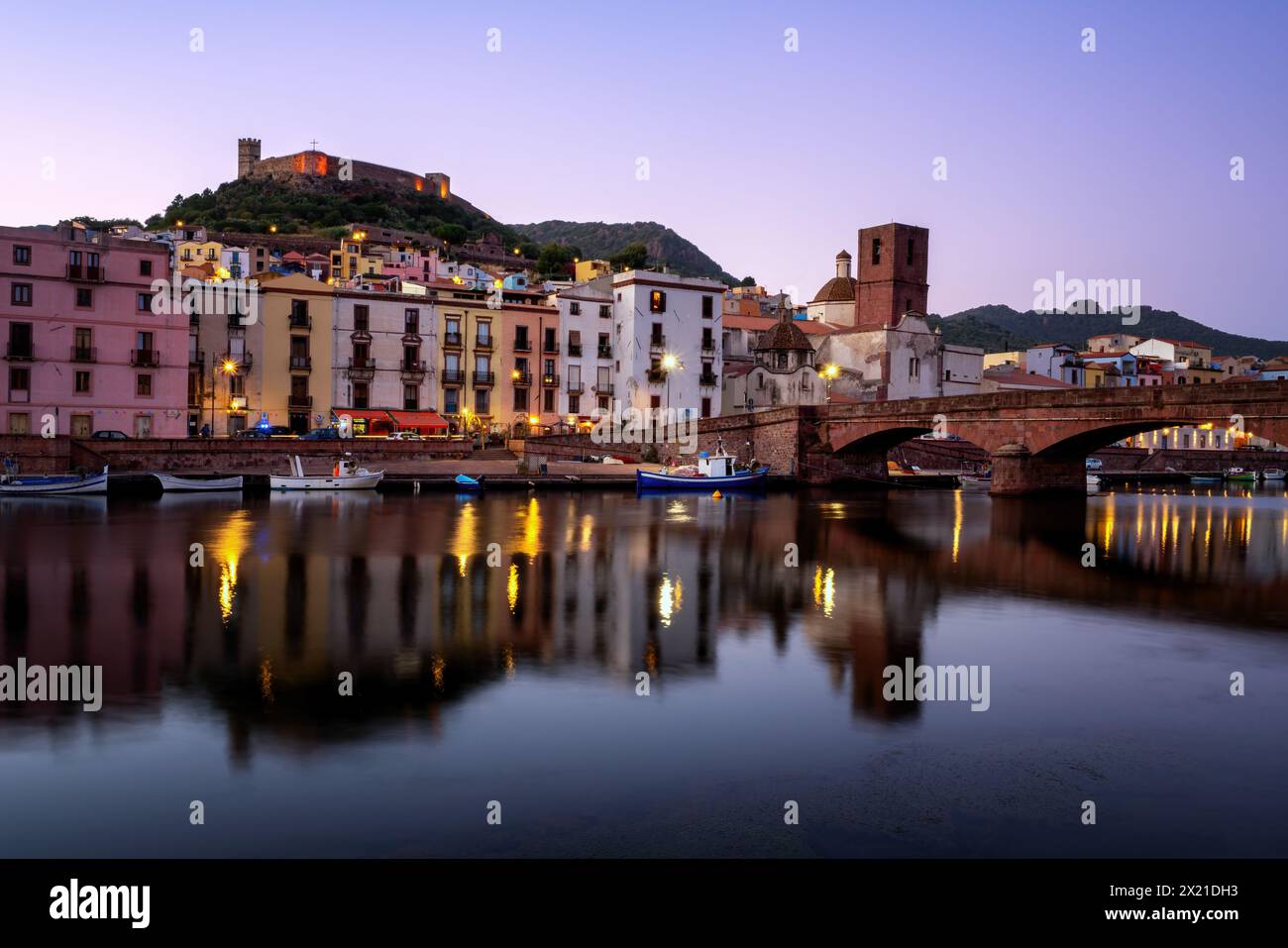Bosa city colorful buildings, historic bridge and castle in Sardinia ...
