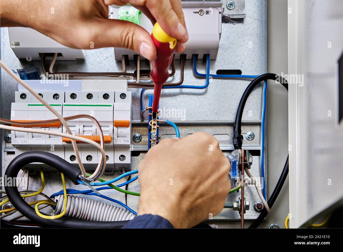 Blue wire of power cable is connected to neutral terminal bar of ...