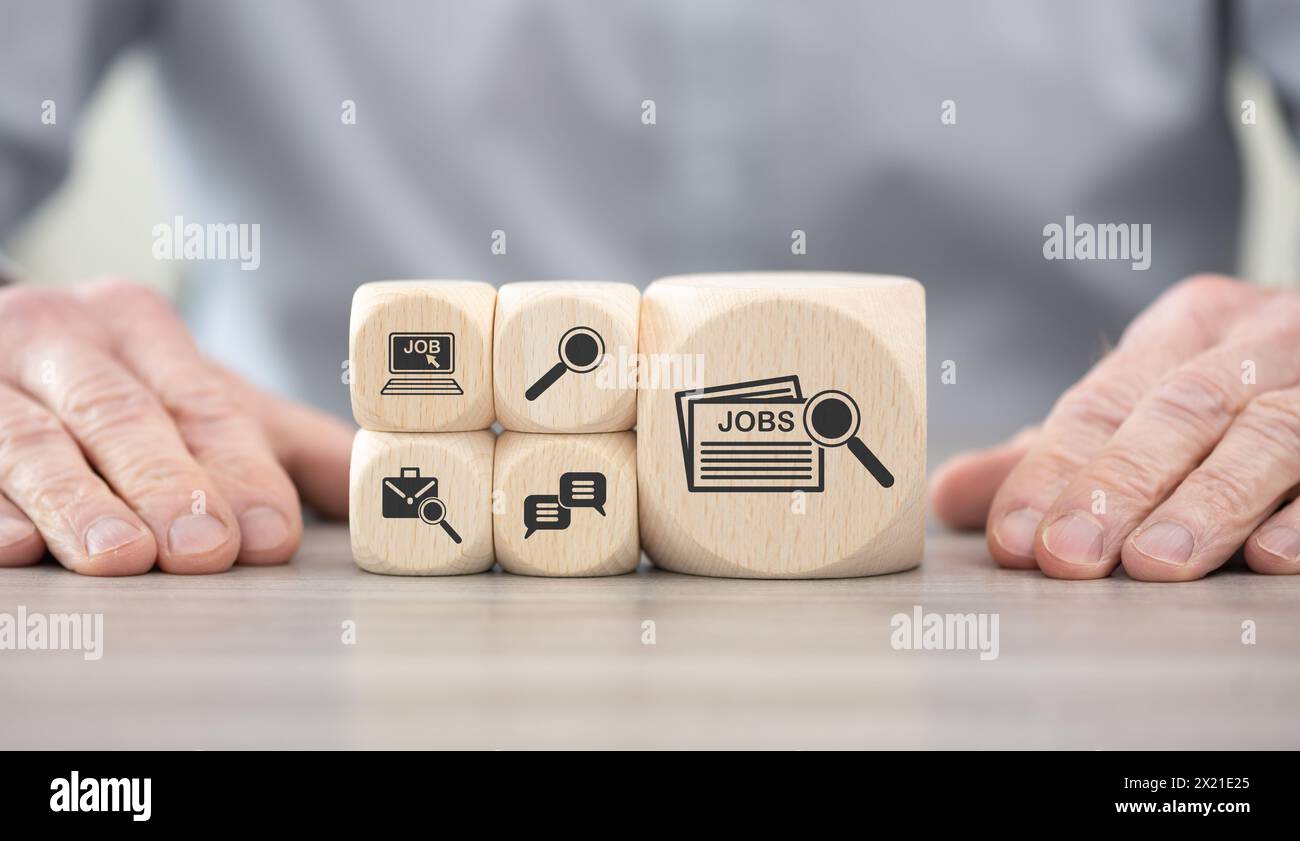 Wooden blocks with symbol of job search concept Stock Photo - Alamy
