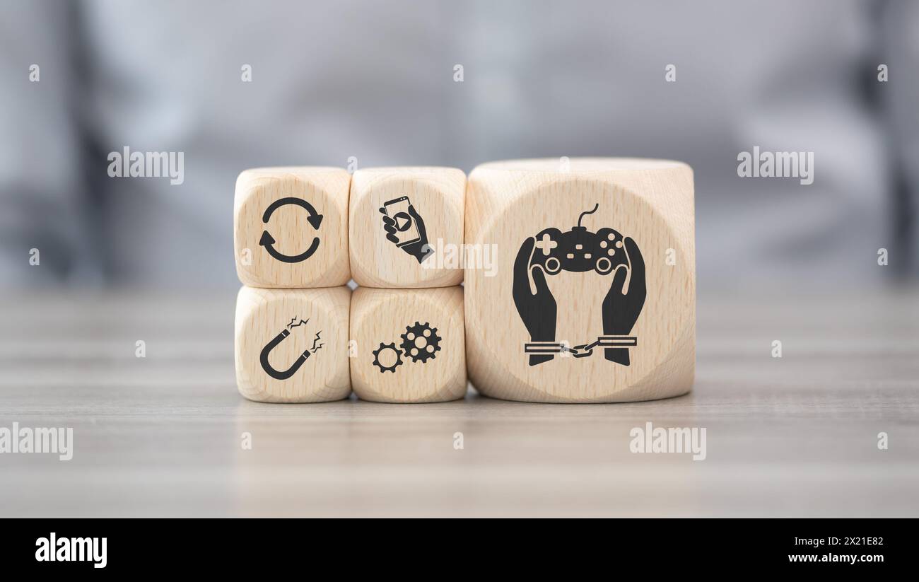 Wooden blocks with symbol of video game addiction concept Stock Photo ...
