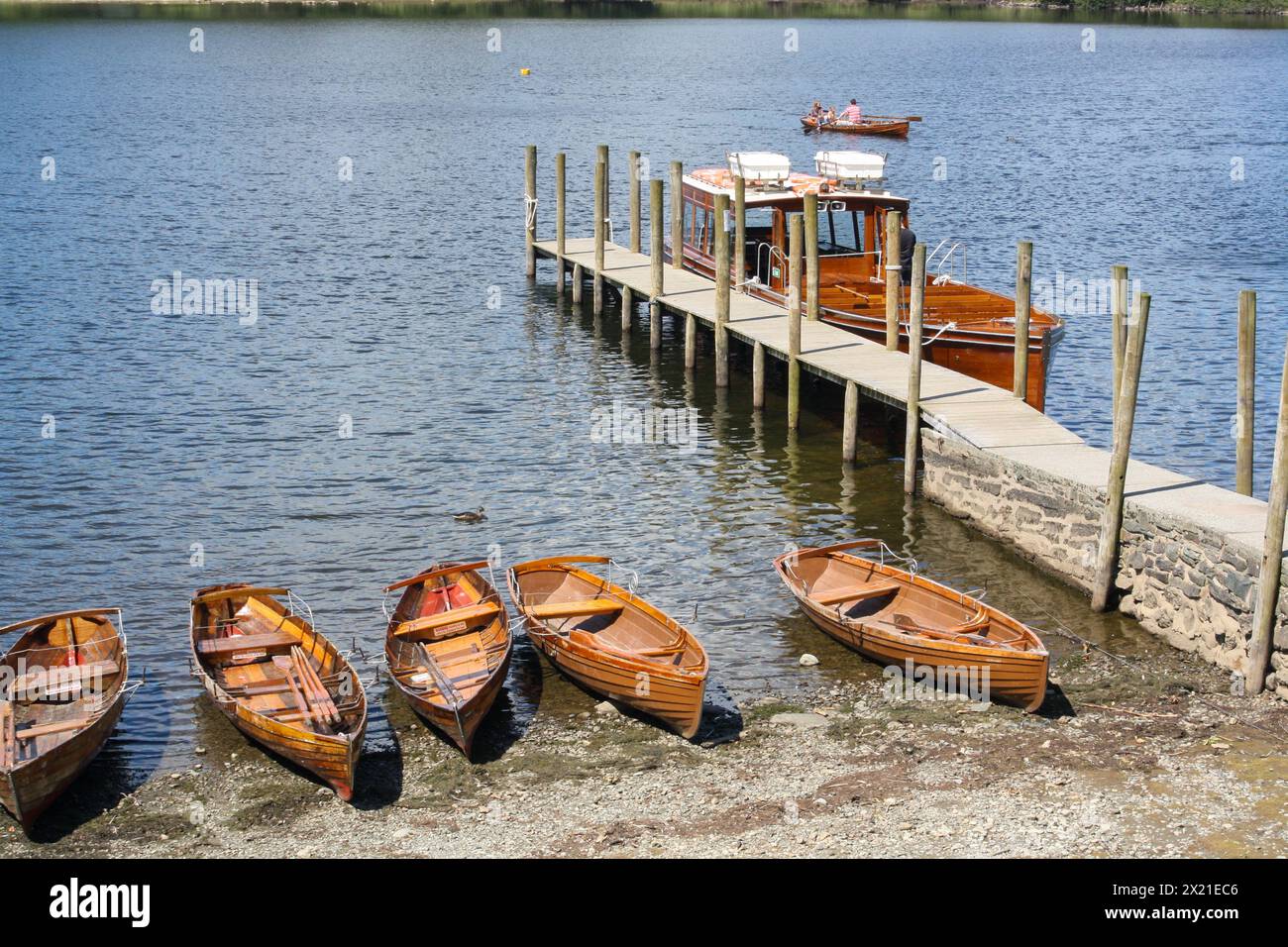Traditional rowboats on a Lake District shore Stock Photo - Alamy
