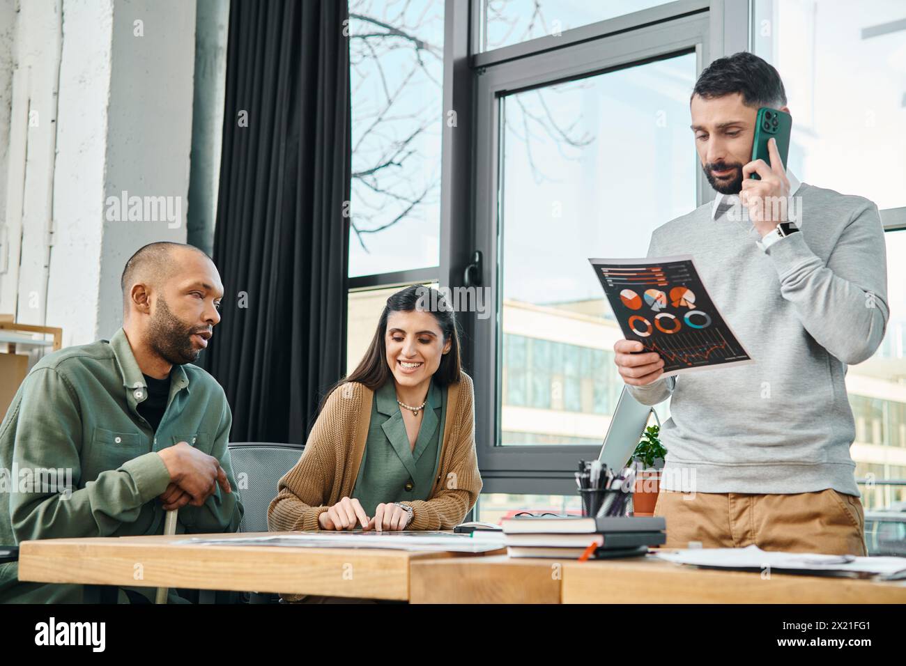 A diverse group of professionals engaged in a lively discussion while ...