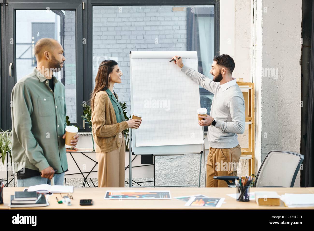 Group around whiteboard in office hi-res stock photography and images ...