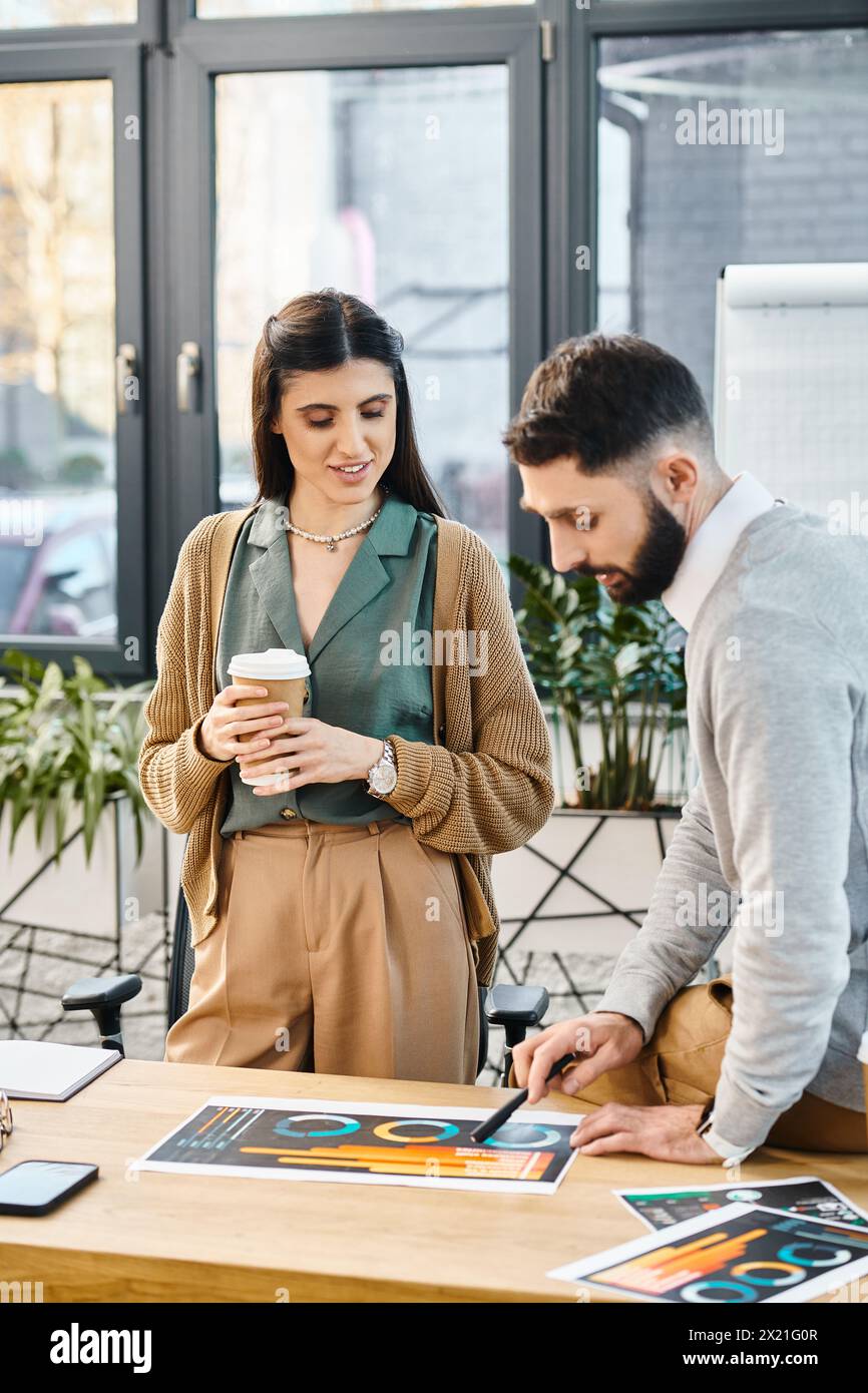 A man and a woman reminiscing over memories captured in photos spread ...