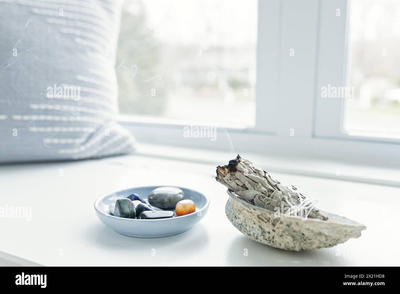 Smudging cleansing practice, white sage Stock Photo - Alamy