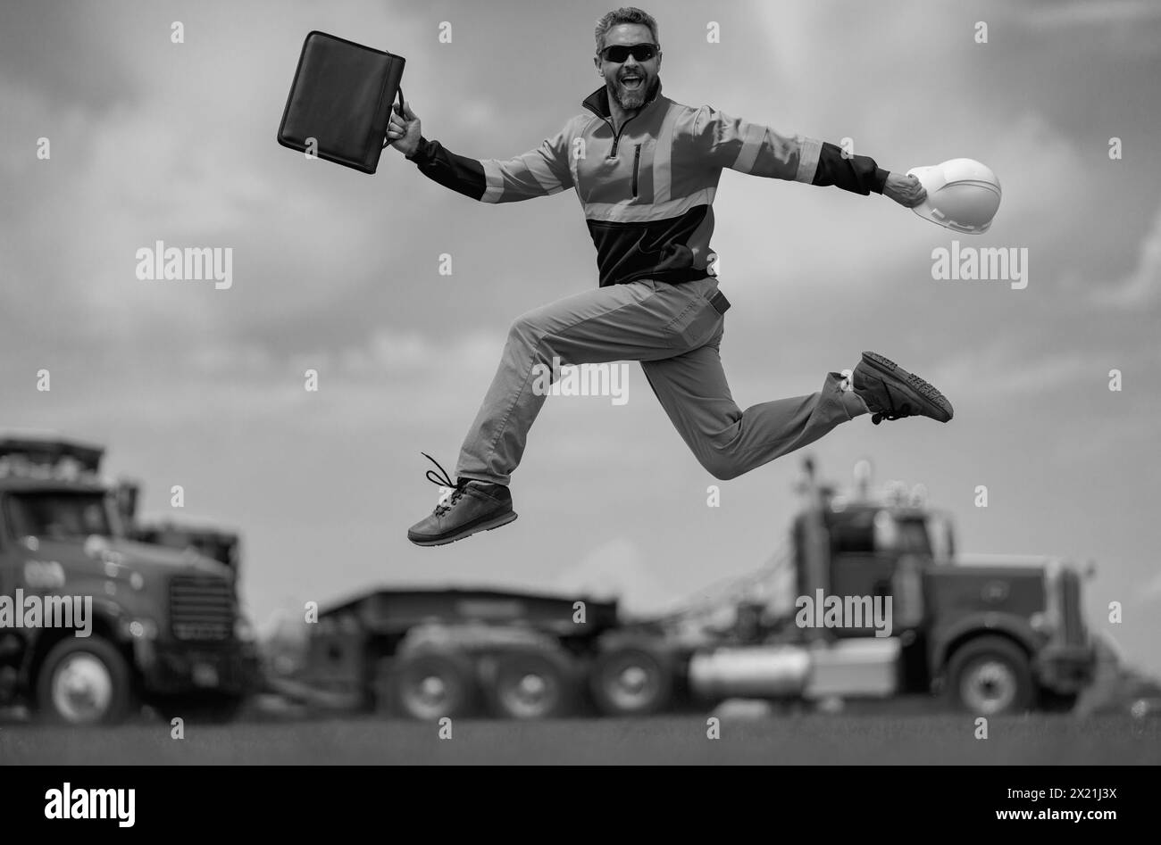 Jump worker construction man Black and White Stock Photos & Images - Alamy