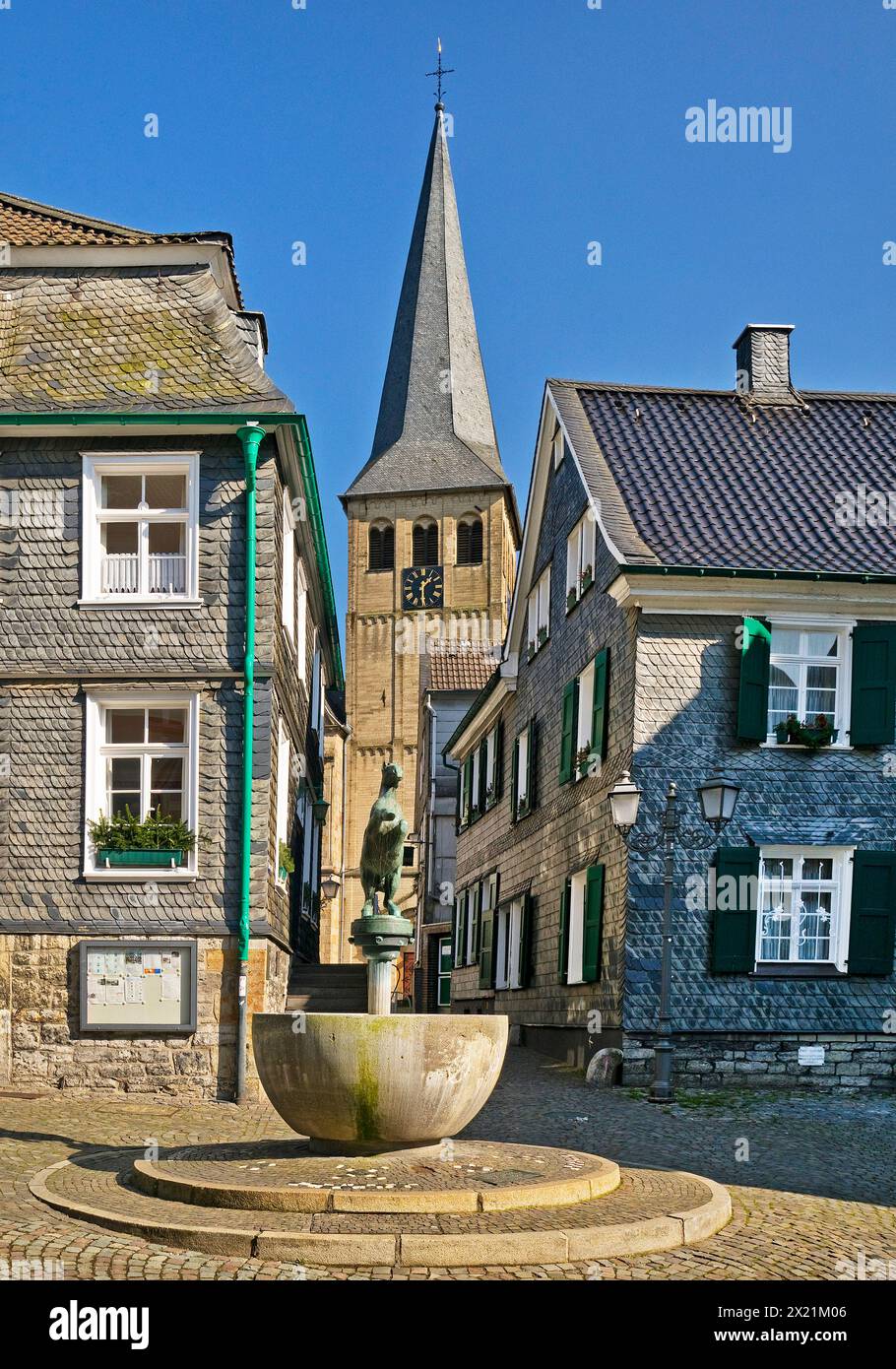 Historic upper town with horse fountain and church tower of St ...