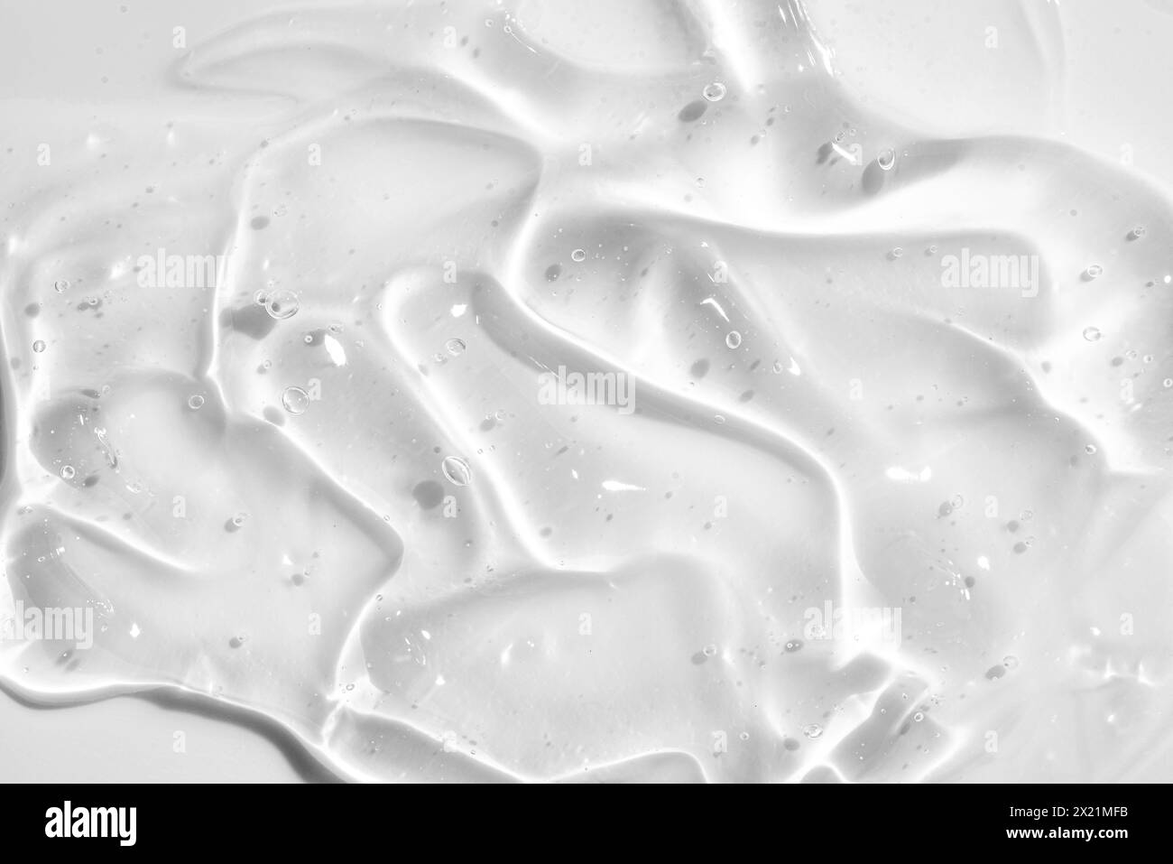 Clear cosmetic gel texture close up. Acid or collagen moisturizing face ...