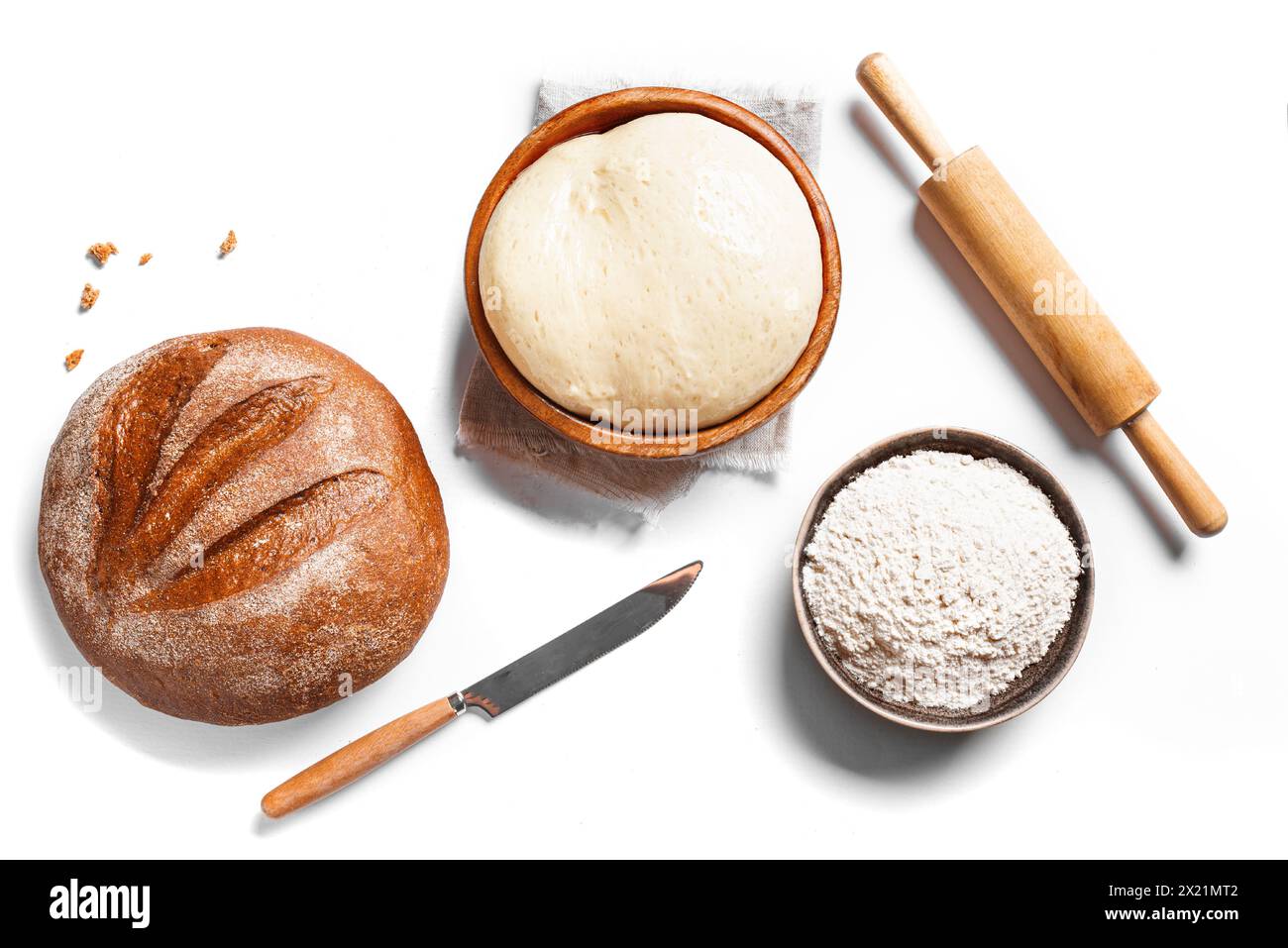 Bread, dough, flour and rolling pin isolated on white background ...