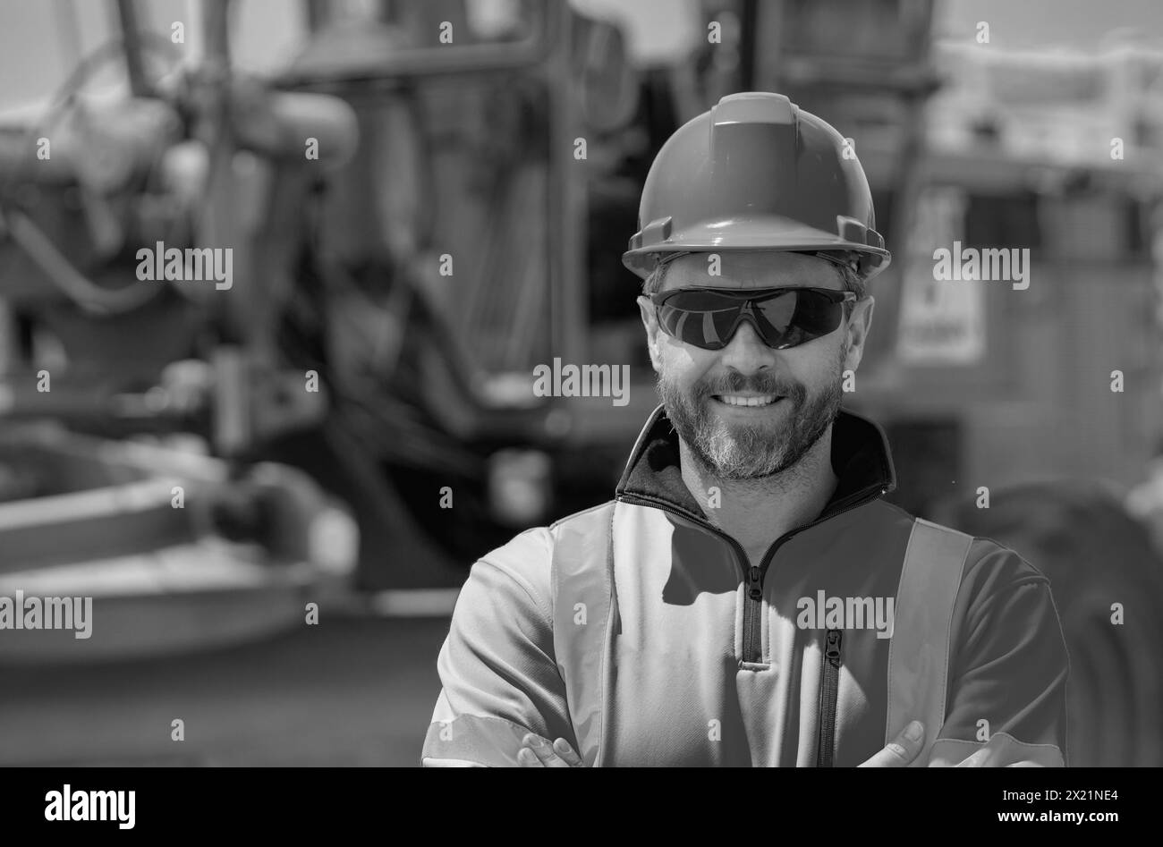 Construction worker at house under construction. Builder in building ...