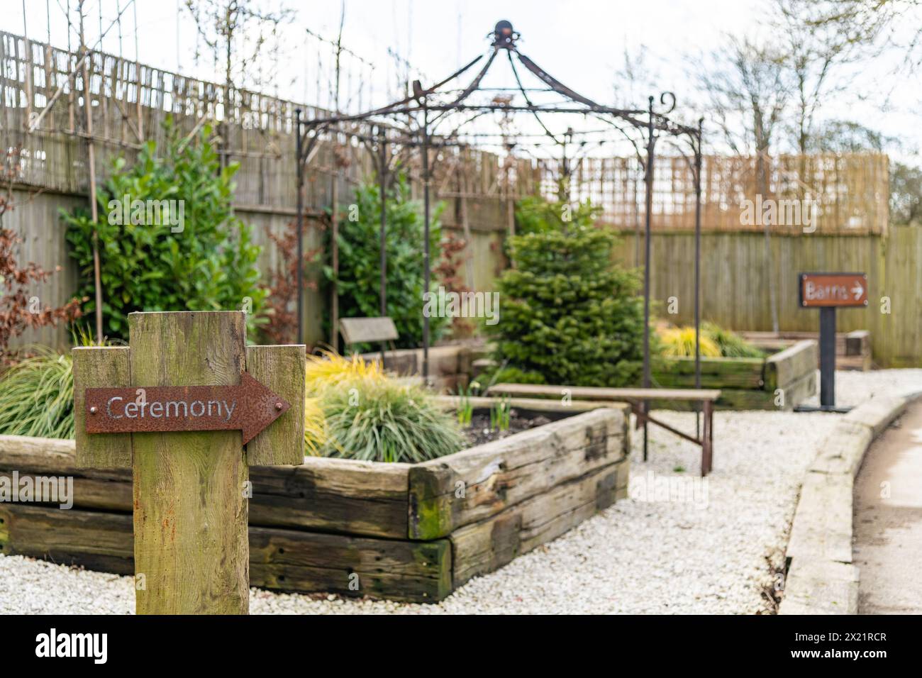 A sign directing guests to a wedding ceremony at Botley Hill Farm in ...