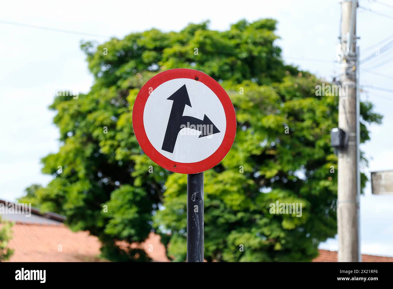 white traffic sign indicating direction ahead and right - go in two ...