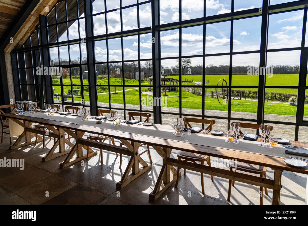 Laid out dinner tables for a wedding reception at Botley Hill Farm in ...