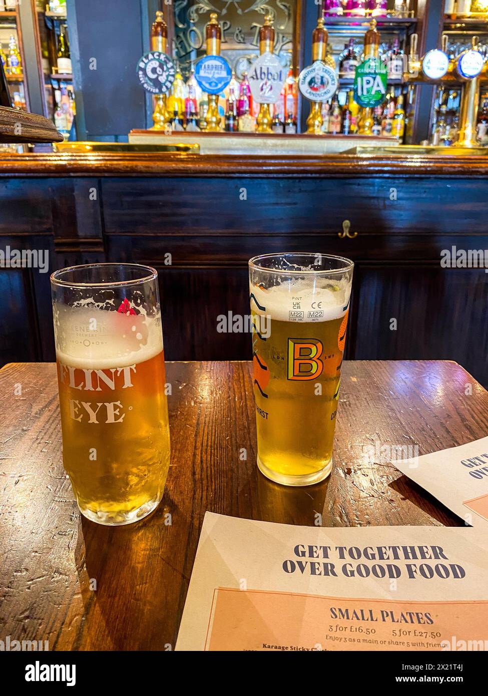 Two beer - Flint Eye and Brixton - is displayed in a pub in London ...
