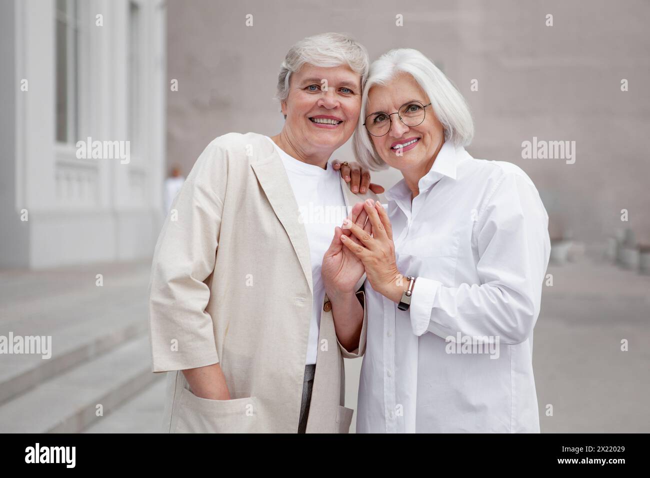 Portrait of beautiful smiling elderly senior women with gray hair ...