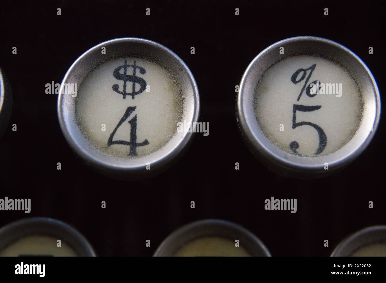 Ultra close up of $ and % keys on old Remington typewriter keyboard ...