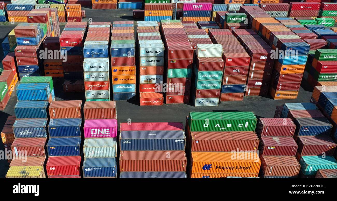A bunch of intermodal containers of various colors ready to be loaded ...