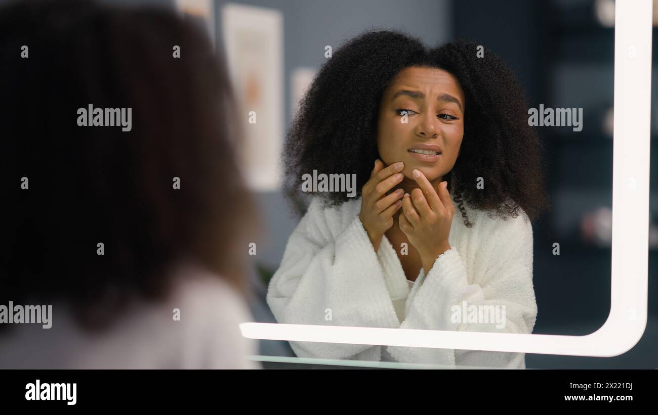 Frustrated African American girl woman female touch face bad condition ...