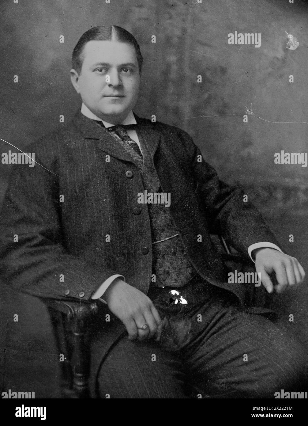 C.B. Gates seated, 1910 Stock Photo - Alamy