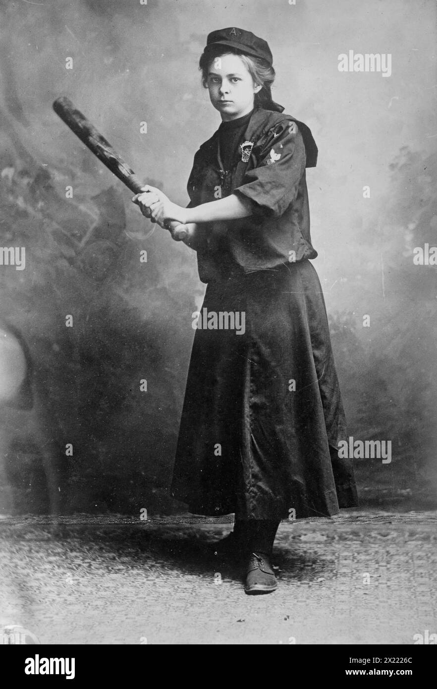 Miss Myrtle Rowe holding a baseball bat, 1910 Stock Photo - Alamy