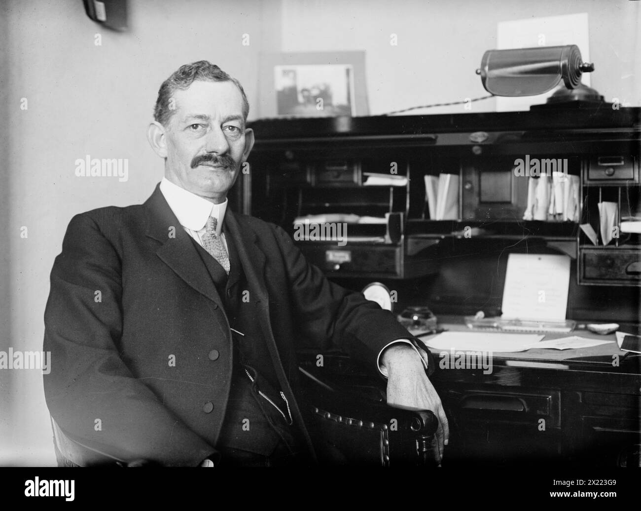 Man sitting glass desk Black and White Stock Photos & Images - Alamy
