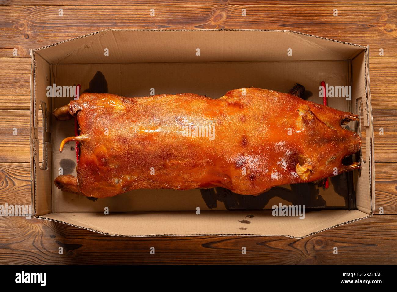 top view roasted whole pig at horizontal composition Stock Photo - Alamy