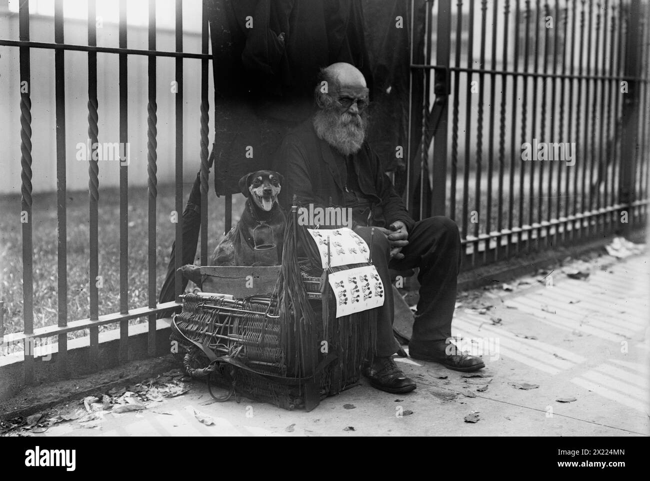 Sitting beggar Black and White Stock Photos & Images - Alamy