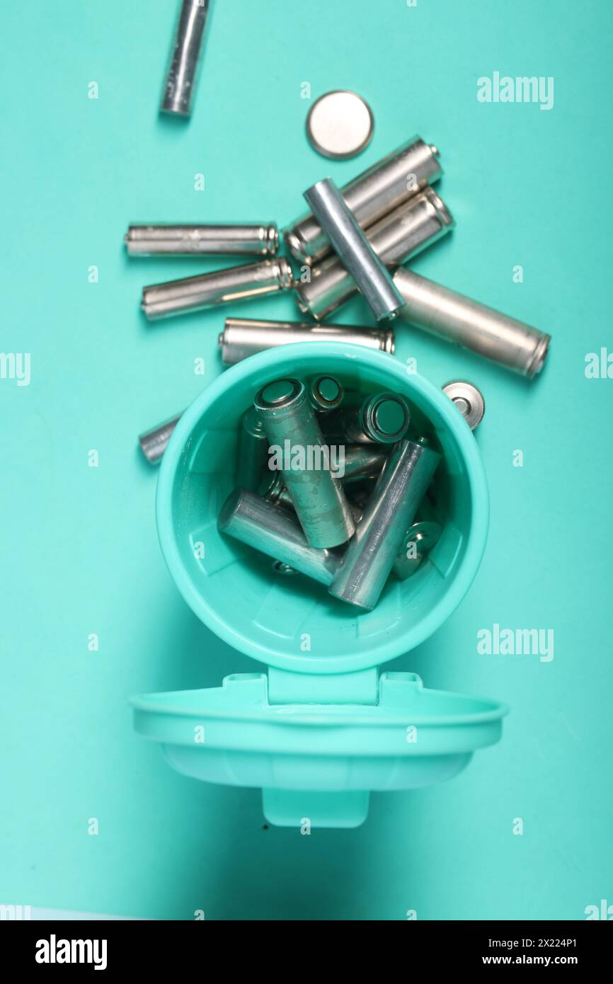 Visual metaphor for recycling electronics: small trash container ...