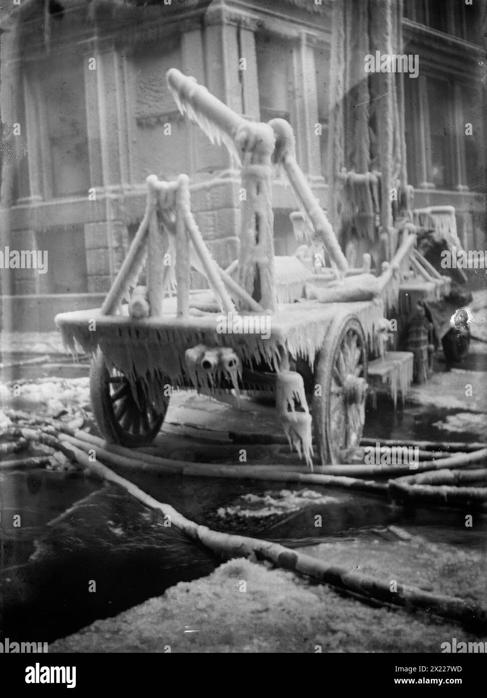 Frozen fire apparatus, Equitable fire, 1912. Shows a fire at the ...
