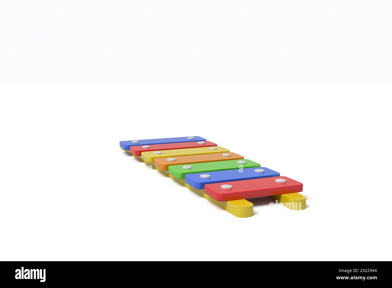 Colorful children's xylophone on yellow base Stock Photo - Alamy