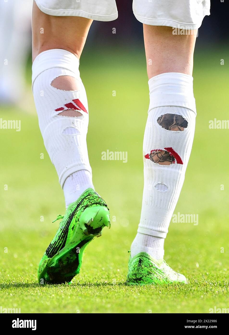 Tattoos are seen through holes on Alejandro Garnacho of Manchester ...