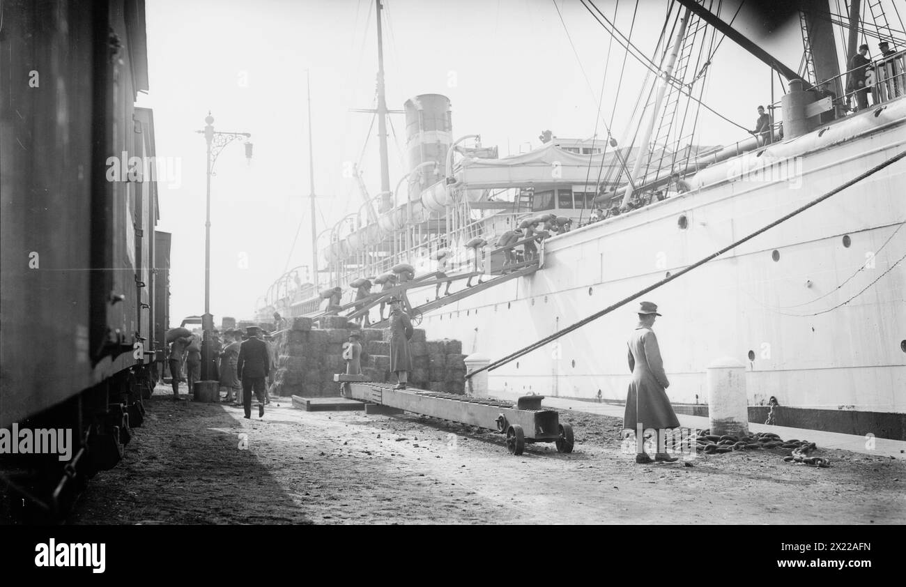 Loading MEADE, 1914. Shows U.S. Army transport ship the U.S.S. Meade ...