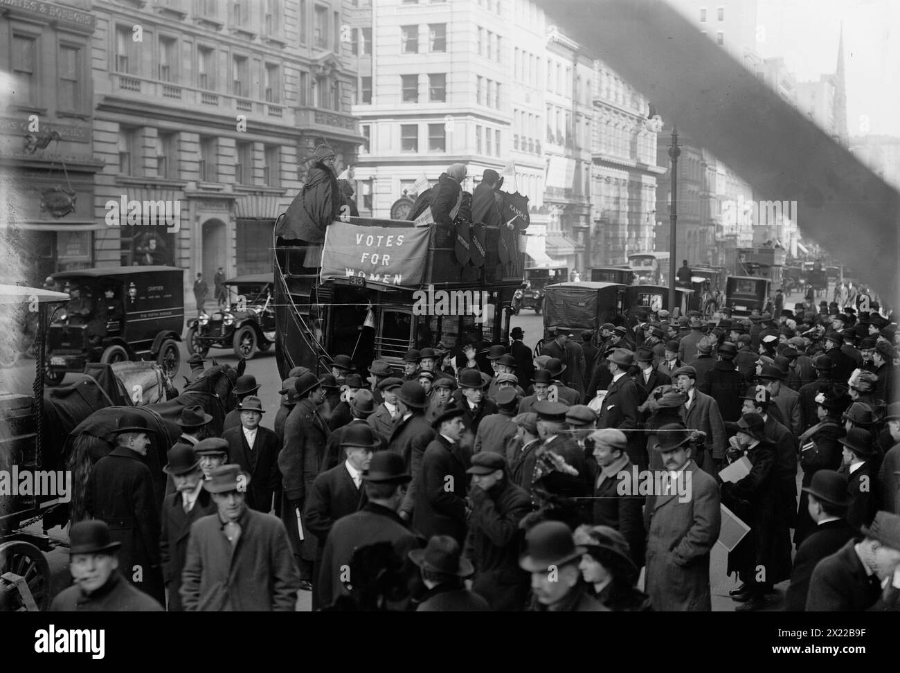 Washington suffrage hikers, 1913. Shows suffragists on bus in New York ...