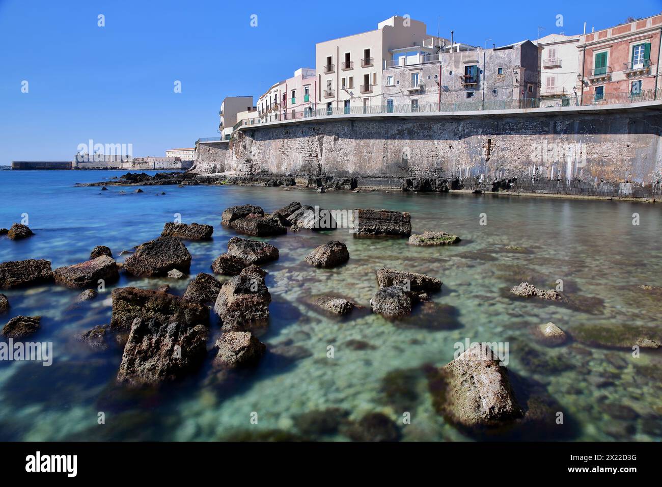 The Eastern rocky coast of Ortigia Island, Syracuse, Sicily, Italy ...
