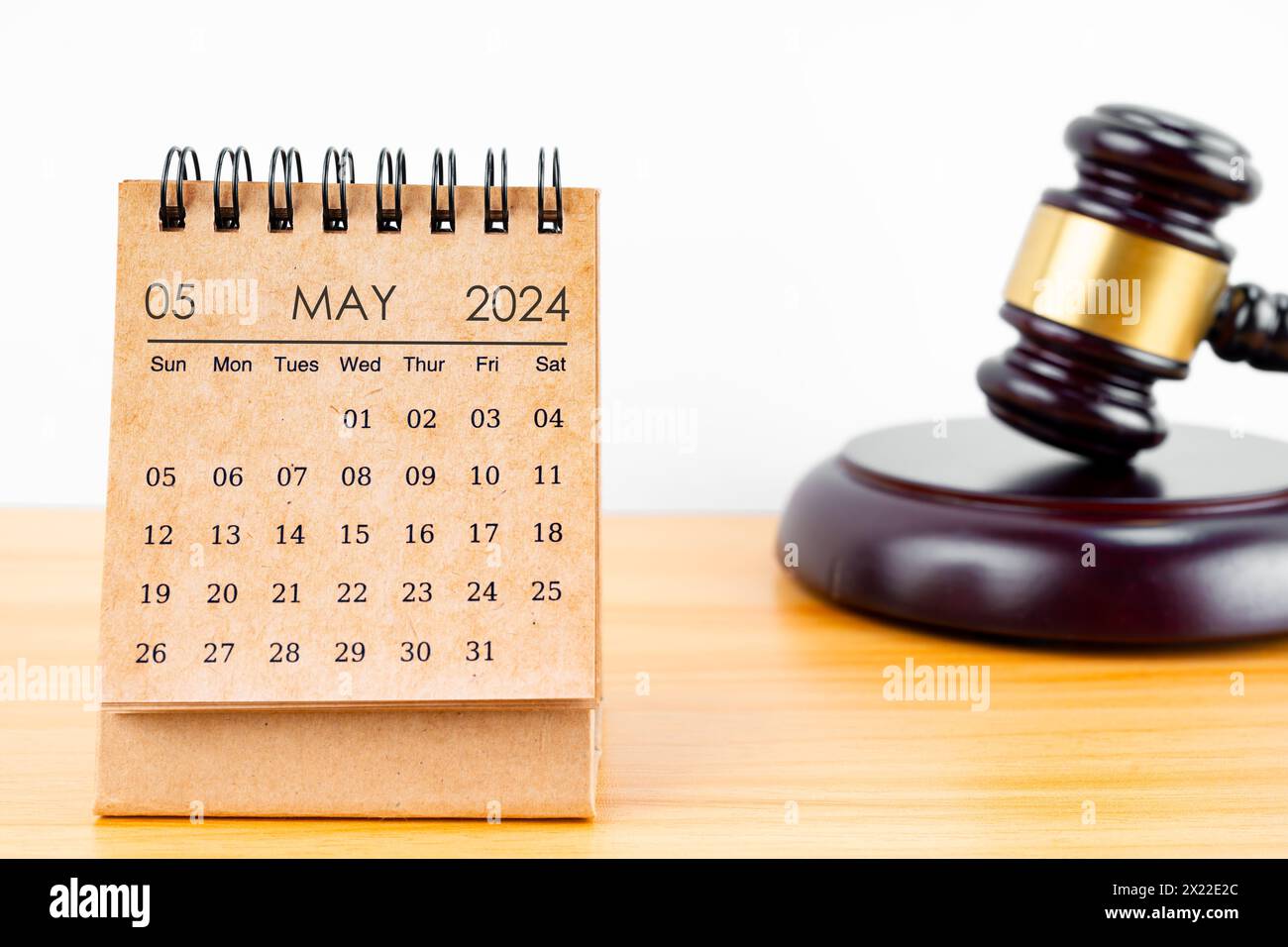 Desk calendar for May 2024 and judge's gavel on the worktable Stock ...