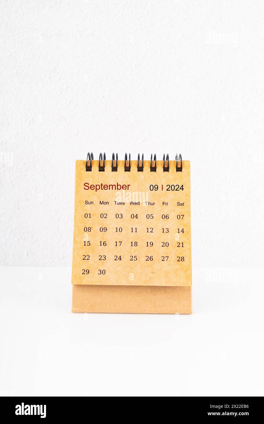 Brown mini desk calendar for September 2024 on white background Stock ...