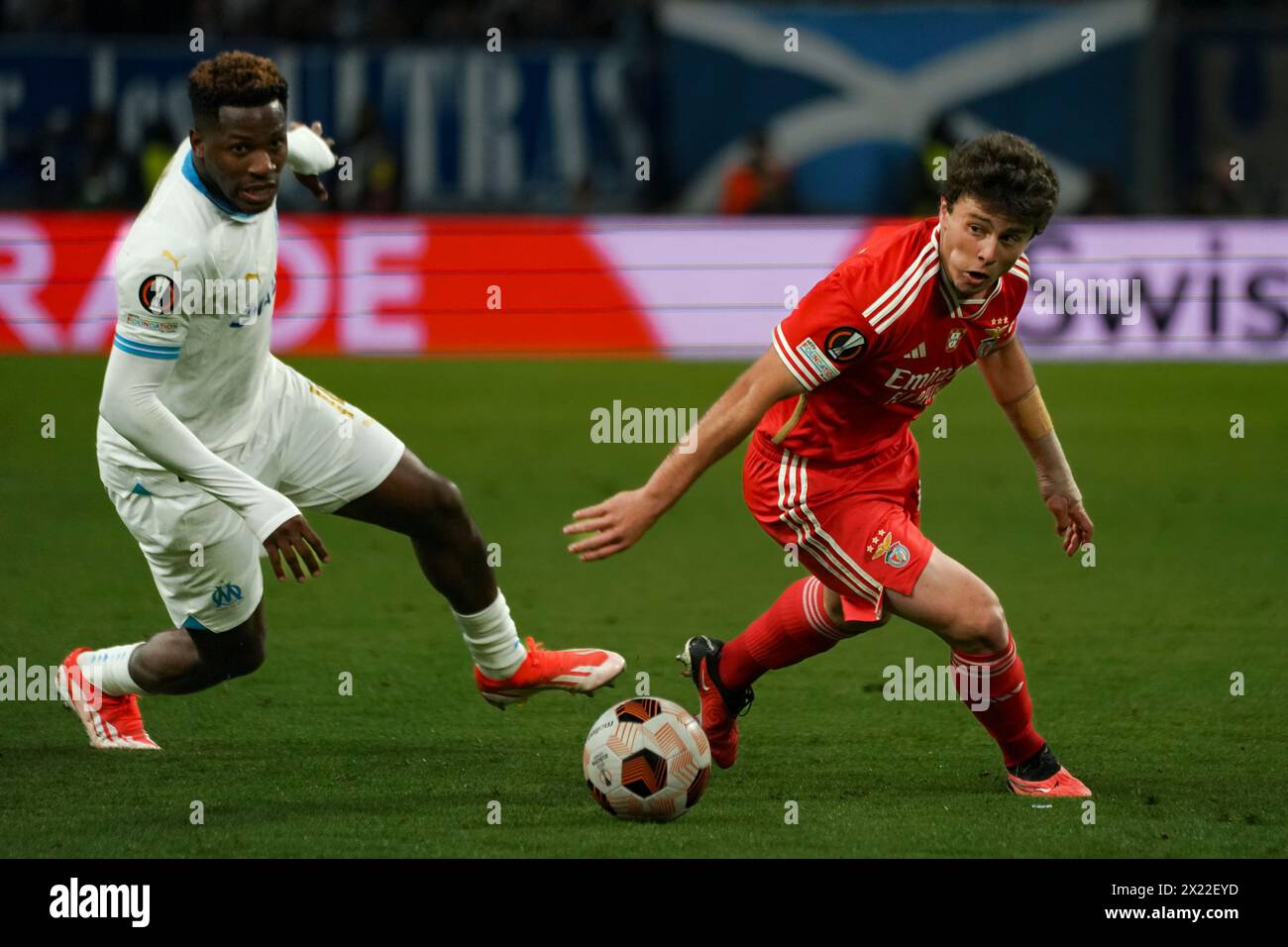 MARSEILLE, FRANCE - 2024/04/18: João Neves (R) of SL Benfica and Faris Pemi Moumbagna (L) of ...