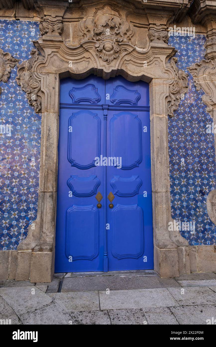 Entrance with a blue door of the Palace of Raio, old classic building ...
