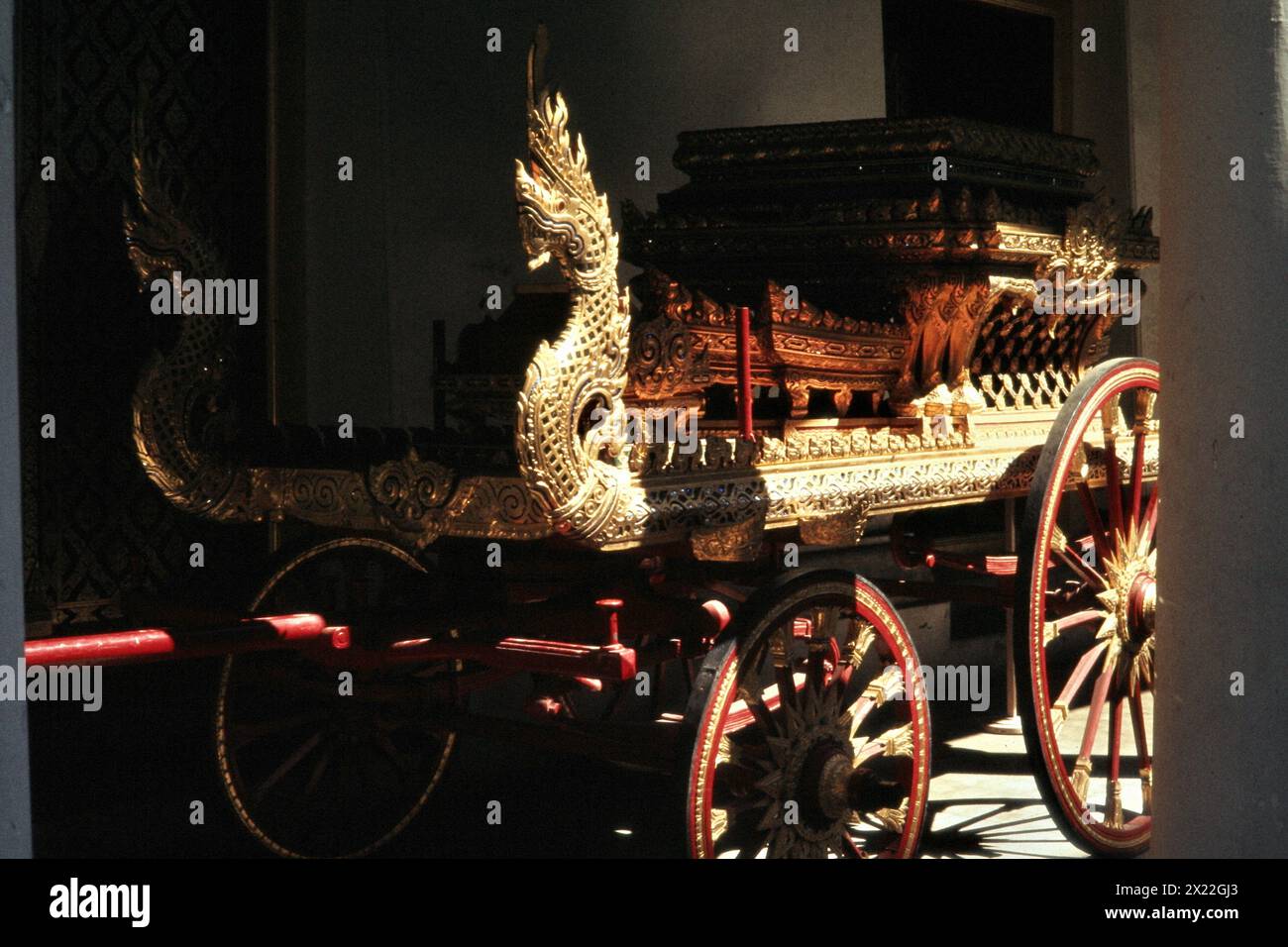 The horse carriage of the Thai king with golden dragon ornaments in a ...