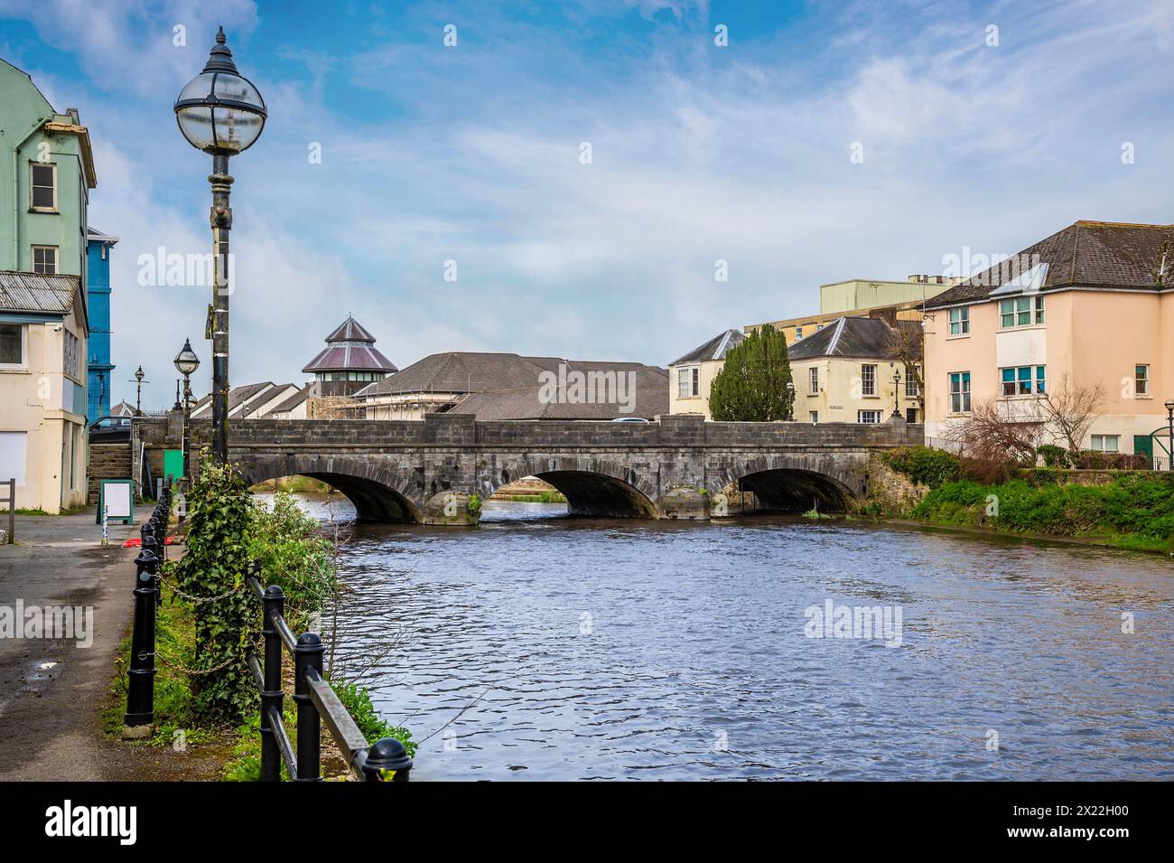 A view along the banks of the River Cleddau towards the road bridge in ...