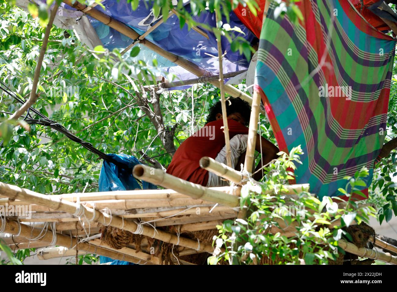 Dhaka, Bangladesh - April 19, 2024: Homeless Maruf is living there by ...