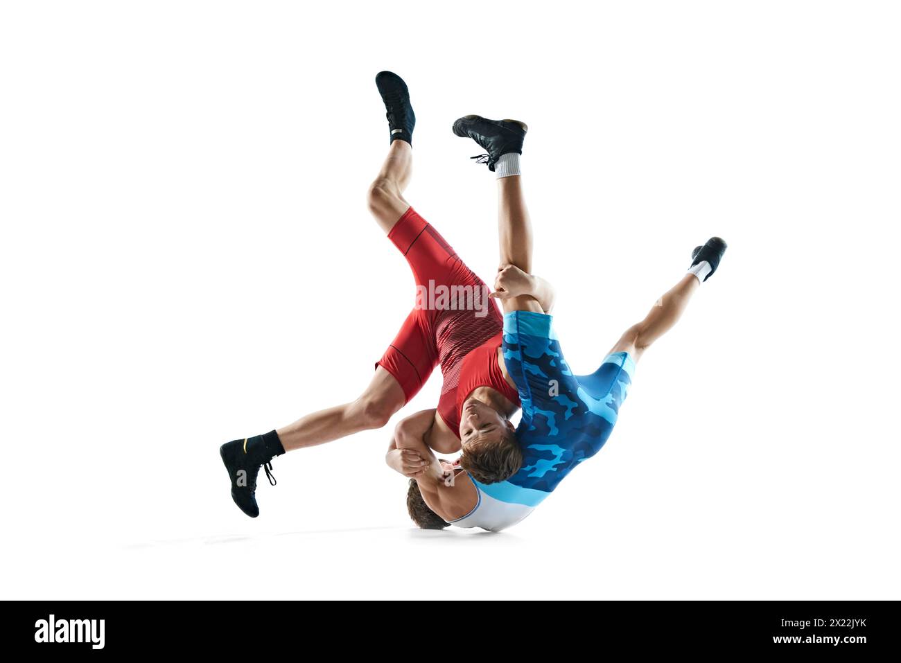 Wrestlers in action, young male competitors in motion, wrestling in ...