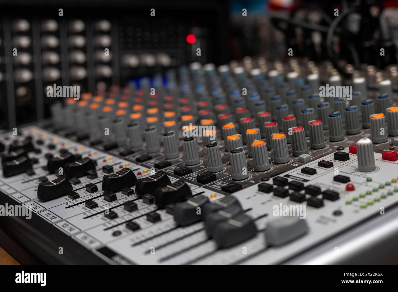 Close-up with selective focus of different knobs and switches of a ...