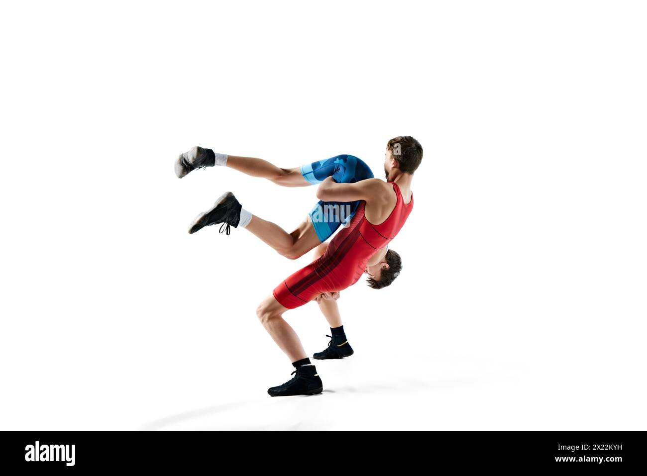 Young men, wrestlers showing athleticism and determination as they ...