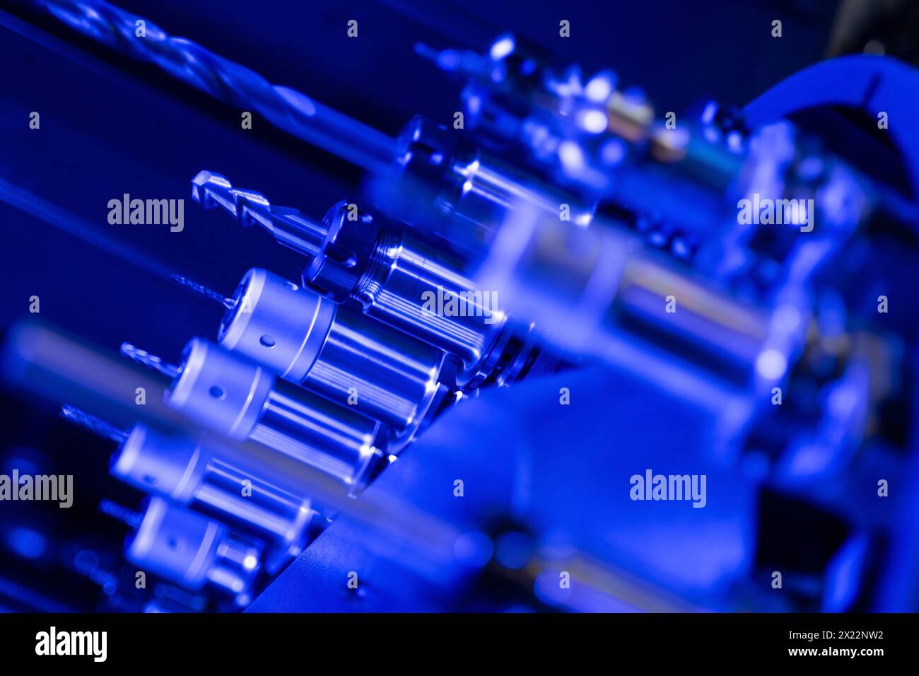 CNC Machine Diamond Cutting Tools Close Up. Blue Illuminated ...