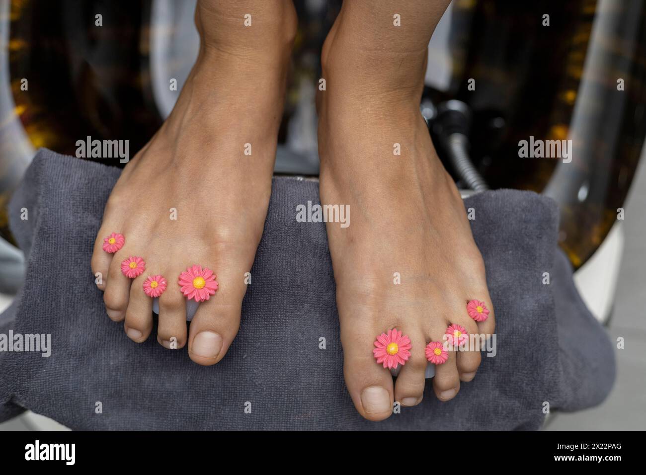 pedicure toe separators in a beauty salon Stock Photo - Alamy