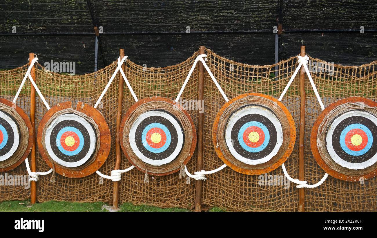 Archery.Athlete aiming at a target and shoots an arrow Stock Photo - Alamy