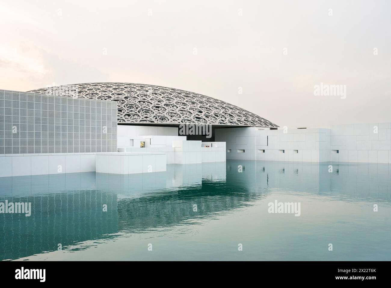 Sculptural cube volumes in water with dome canopy. Louvre Abu Dhabi ...