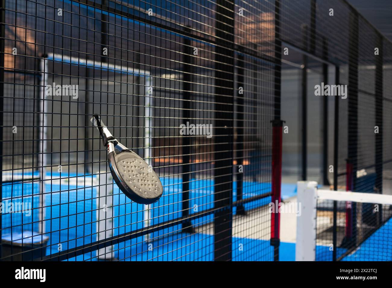 Paddle objects on blue turf Stock Photo - Alamy